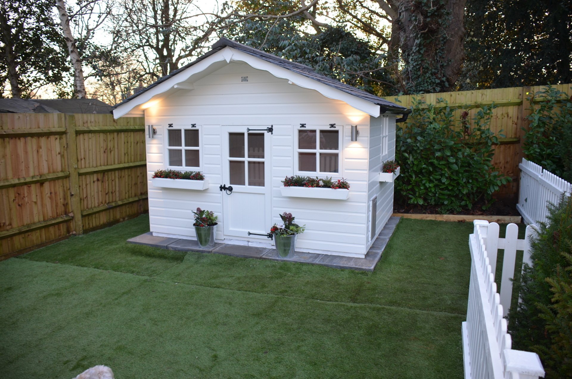 A selection of our beautiful, bespoke heated and lit dog cottages