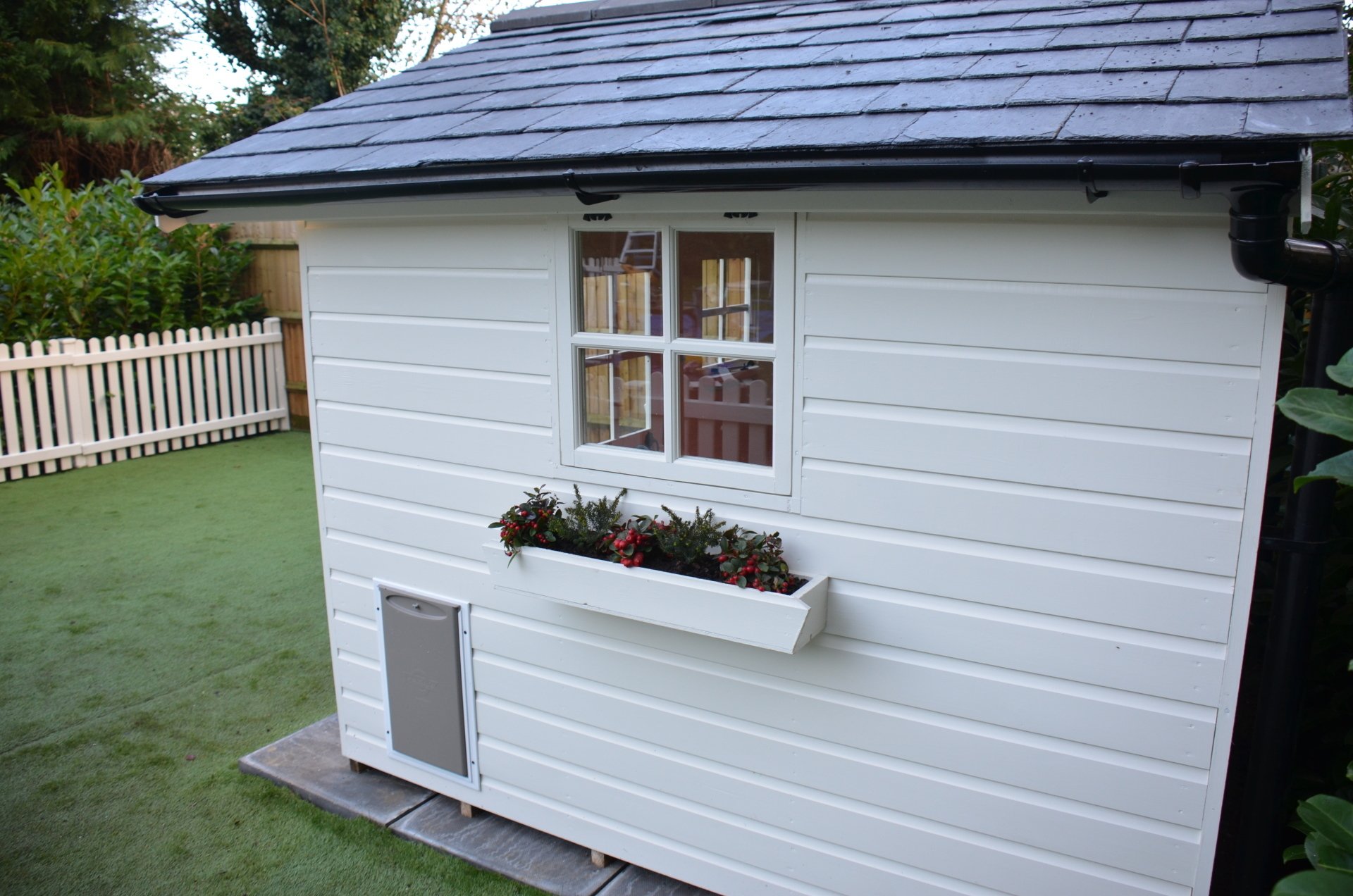 A selection of our beautiful, bespoke heated and lit dog cottages