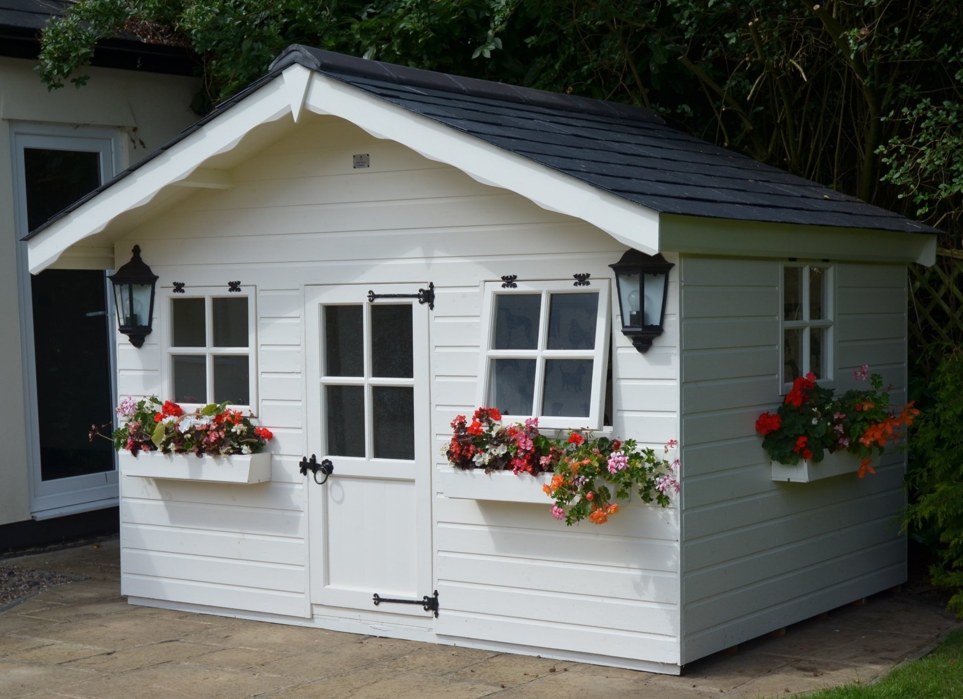 A selection of our beautiful, bespoke heated and lit dog cottages