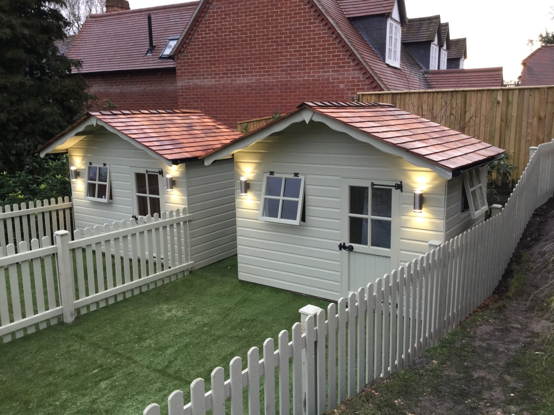 A selection of our beautiful, bespoke heated and lit dog cottages